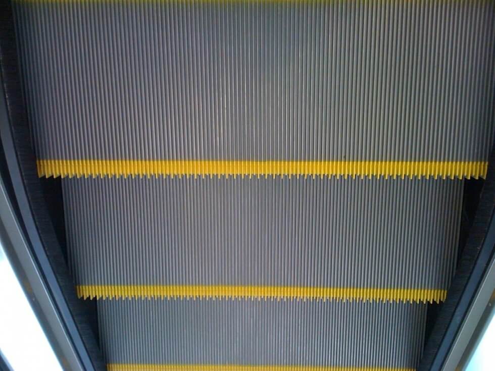 Yellow Safety Demarcation Painting - ESD Escalator Aesthetics